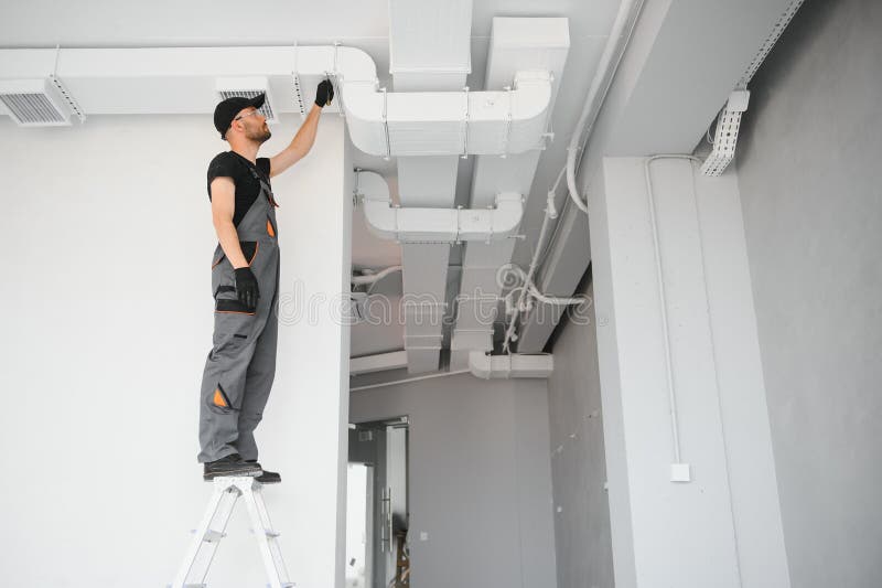 Hvac Services, Worker Install Ducted Pipe System for Ventilation and ...