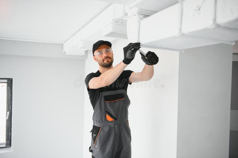 Hvac Services, Worker Install Ducted Pipe System for Ventilation and ...