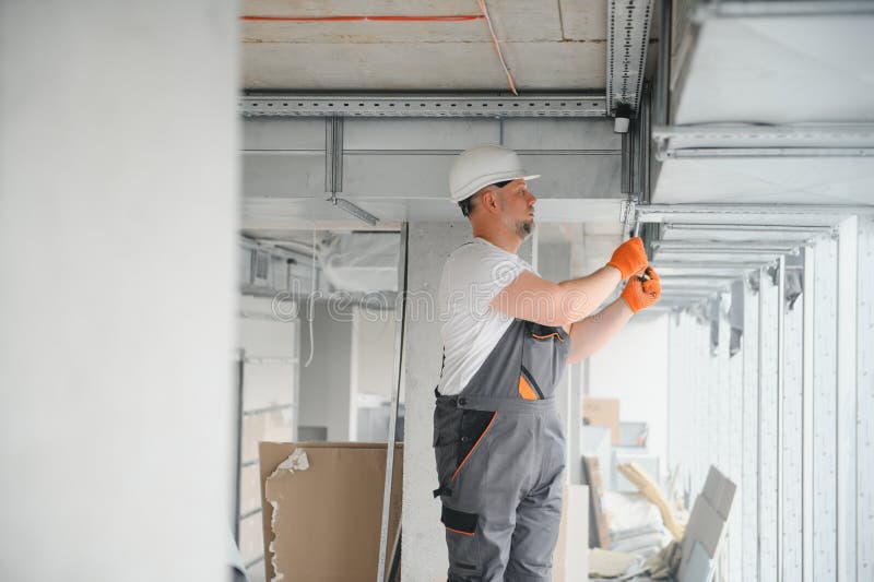 Hvac Services - Worker Install Ducted Pipe System for Ventilation and ...