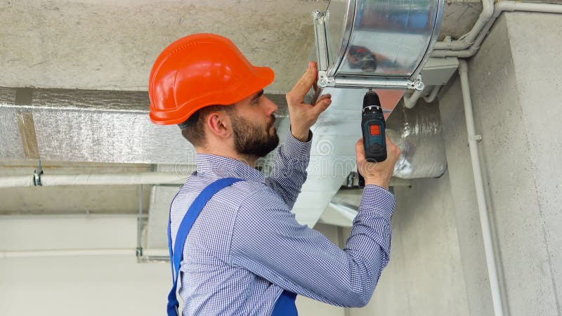 Hvac Worker Install Ducted Pipe System for Ventilation and Air ...