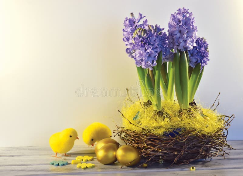 Hyacinths with Easter eggs stock photo. Image of candle - 88647114