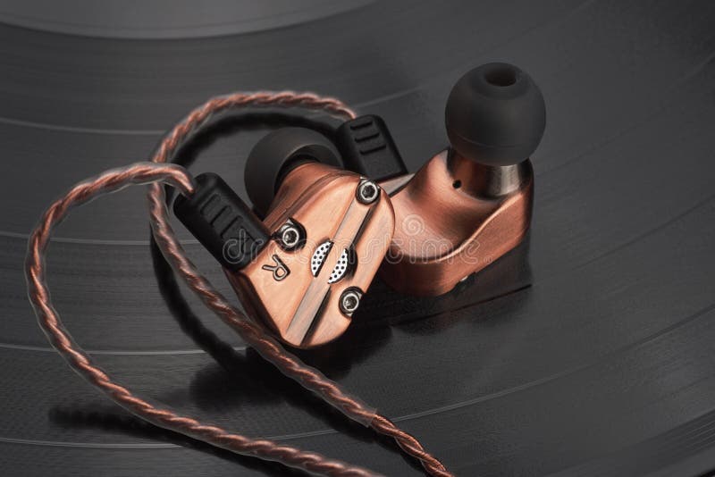 Hybrid Ear-buds on the LP Vinyl Record Stock Image - Image of copper ...