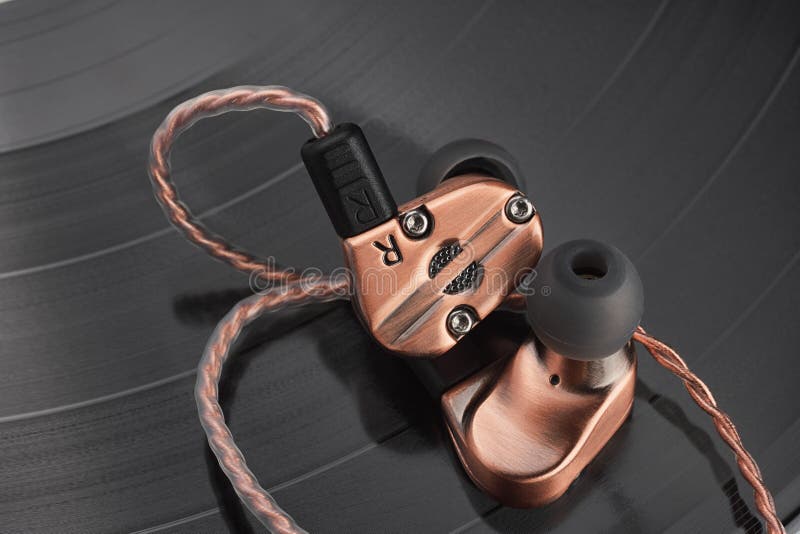 Hybrid Ear-buds on the LP Vinyl Record Stock Photo - Image of ...