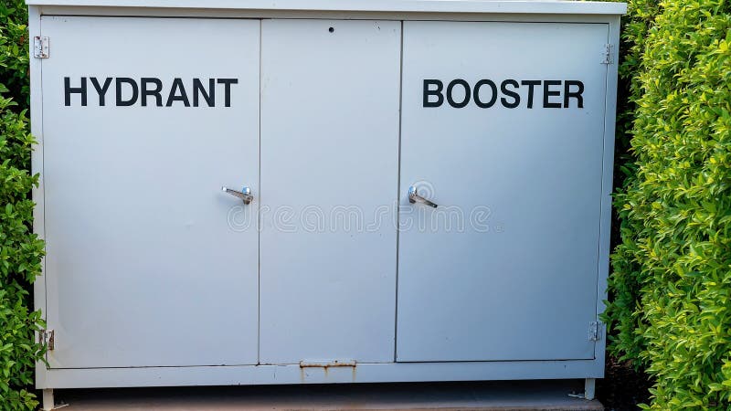 Hydrant Booster Behind Locked Doors Stock Photo - Image of flame ...