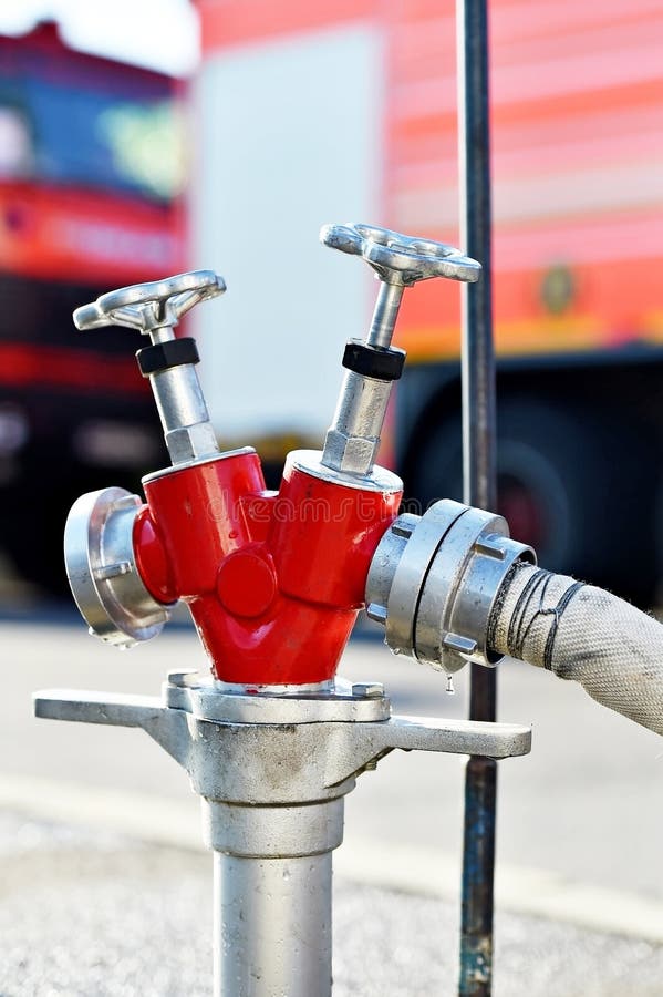 Hydrant with Firefighter Cars in Background Stock Photo - Image of ...