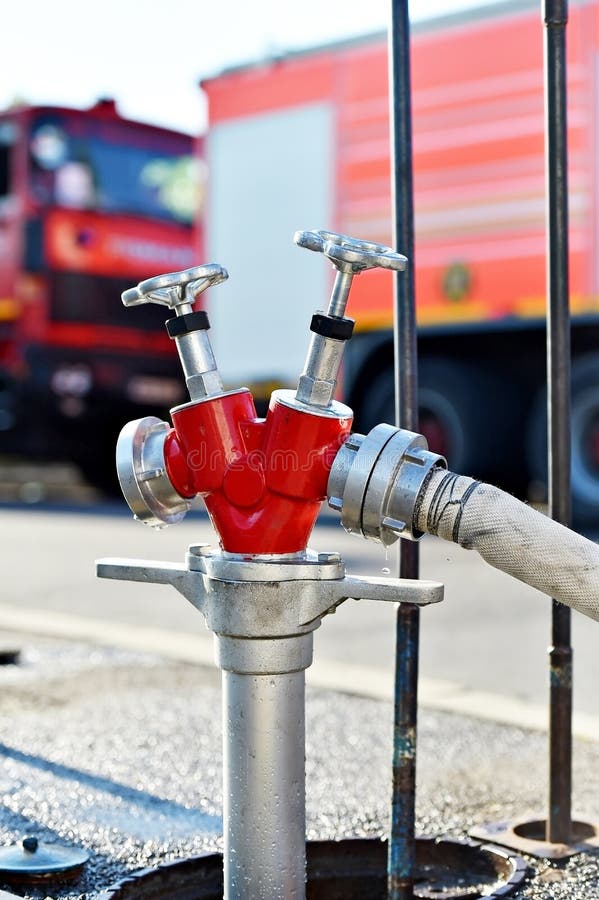 Hydrant with Firefighter Cars in Background Stock Photo - Image of ...