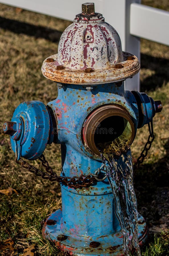 Hydrant with flowing water stock photo. Image of steel - 114611760