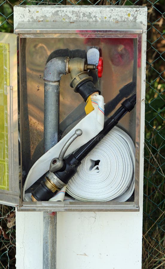 Hydrant with Hose To Put Out Fires Inside the Box Stock Image - Image ...