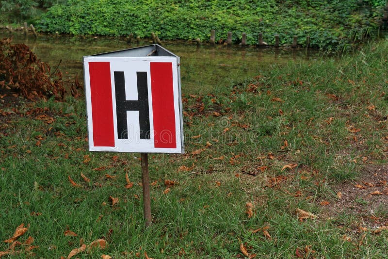 Hydrant sign on the lawn stock photo. Image of hydrant - 193048410
