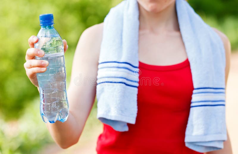 Hydration during workout stock image. Image of female - 34814955