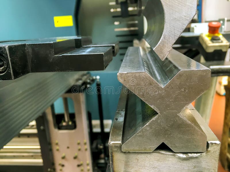 Hydraulic Bending of Galvanized Sheet Metal in a Factory Stock Photo ...