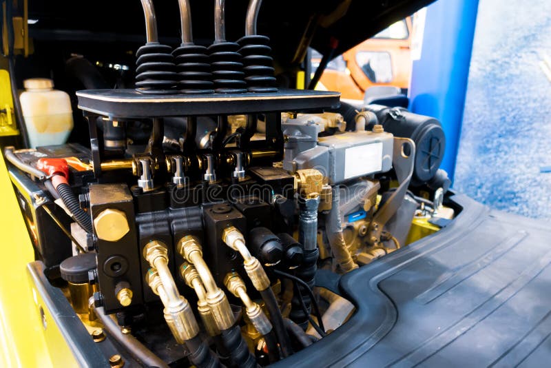 Hydraulic Boosters for Control Levers in an Electric Forklift Stock ...