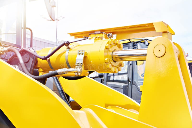 Hydraulic cylinder stock image. Image of vehicle, yellow - 271604683