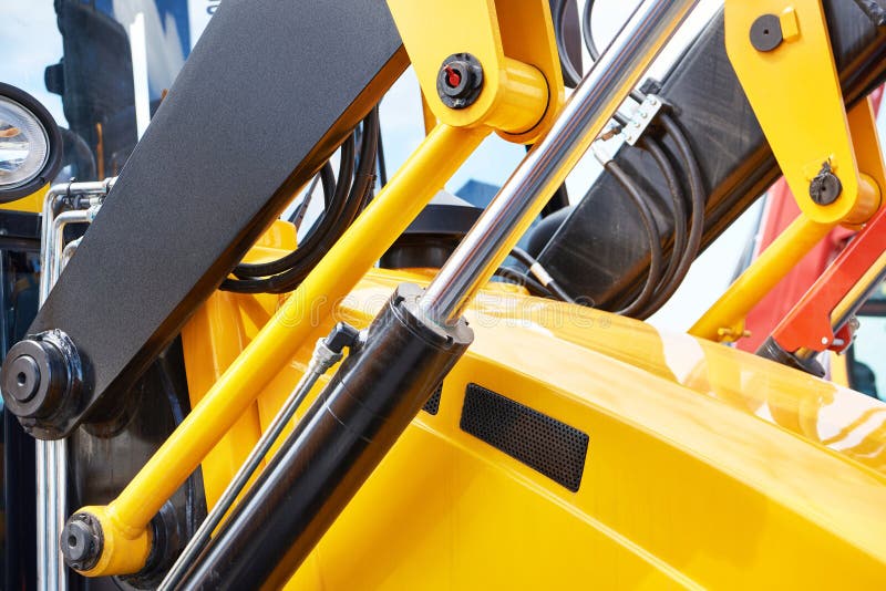 Hydraulic cylinder stock image. Image of machine, yellow - 321813401