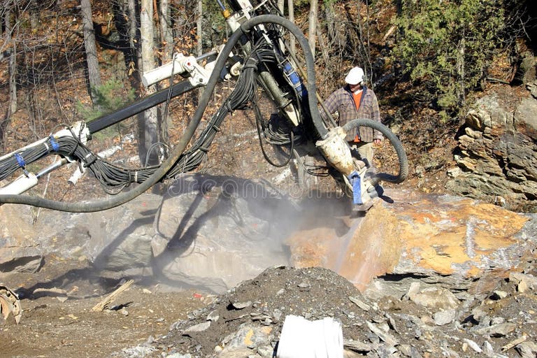 Hydraulic Drill Boring into Rocks Stock Image - Image of industrial ...