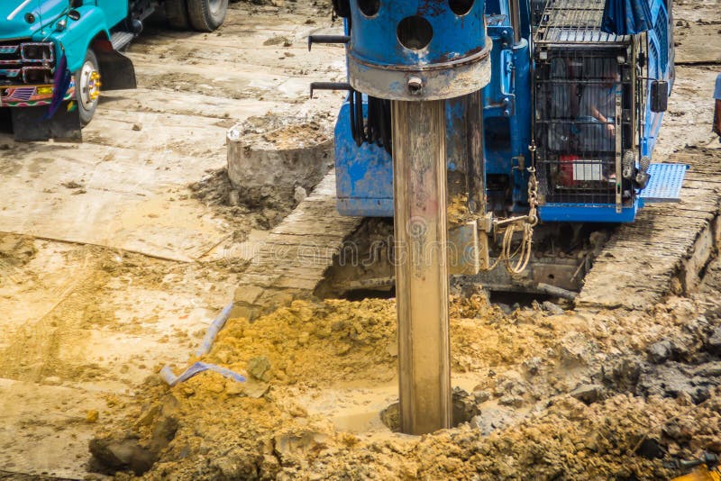 Hydraulic Drilling Machine is Boring Holes in the Construction Site for ...