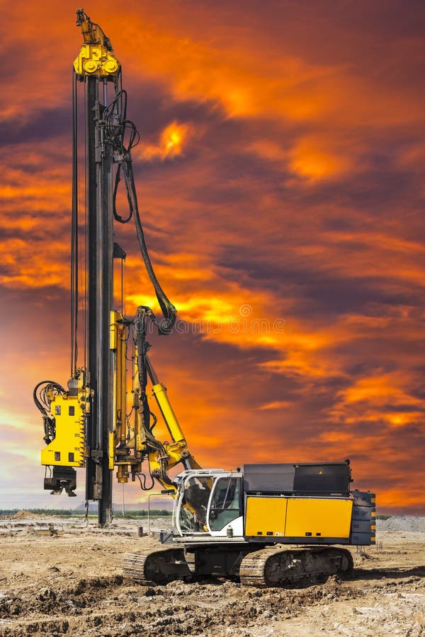 Hydraulic Drilling Machine at the Construction Site Makes Piles. Pile ...