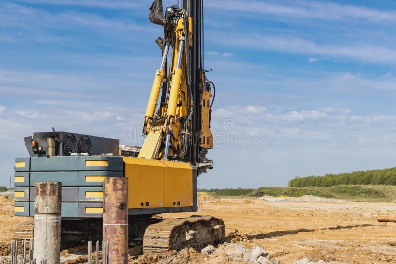 Hydraulic Drilling Machine at the Construction Site. Pile Field. Modern ...