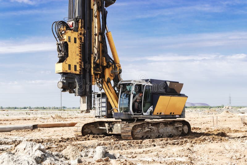 Hydraulic Drilling Machine at the Construction Site. Pile Field. Modern ...