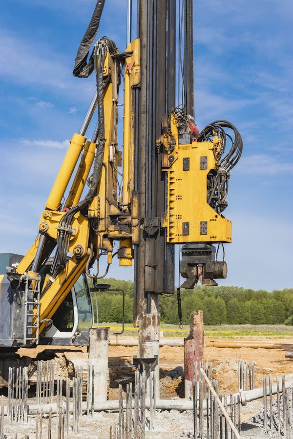 Hydraulic Drilling Machine at the Construction Site. Pile Field. Modern ...