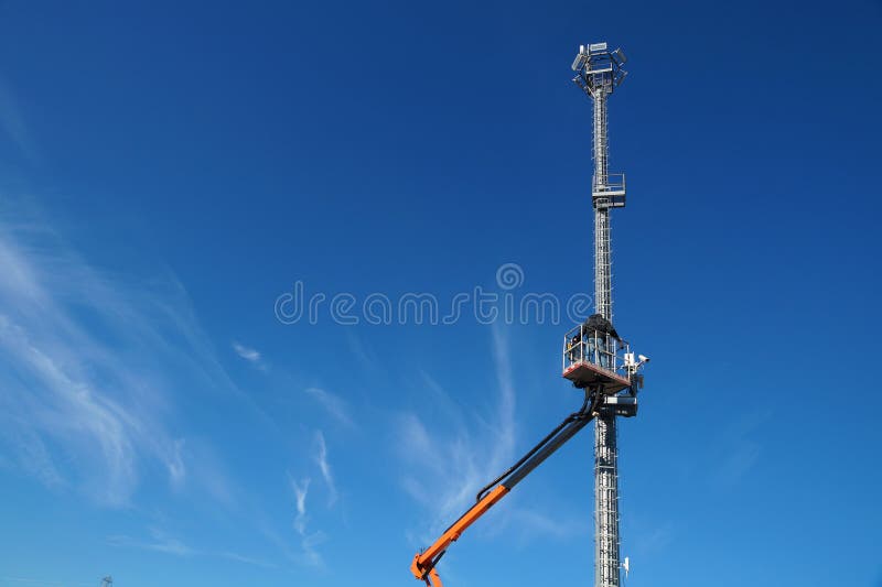 Hydraulic Mobile Construction Platform Elevated Towards a Blue Sky with ...