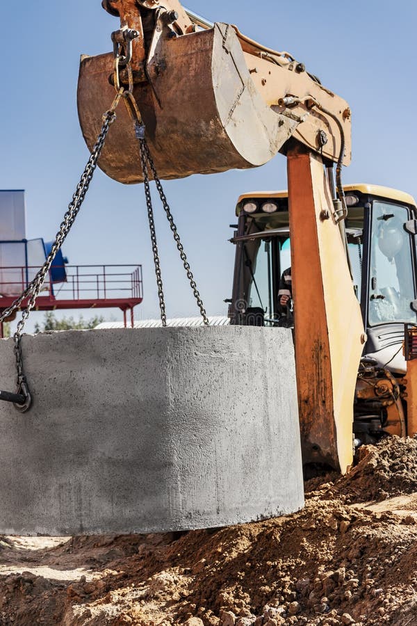 Hydraulic Piston System of the Excavator with a Bucket, Lowering into ...