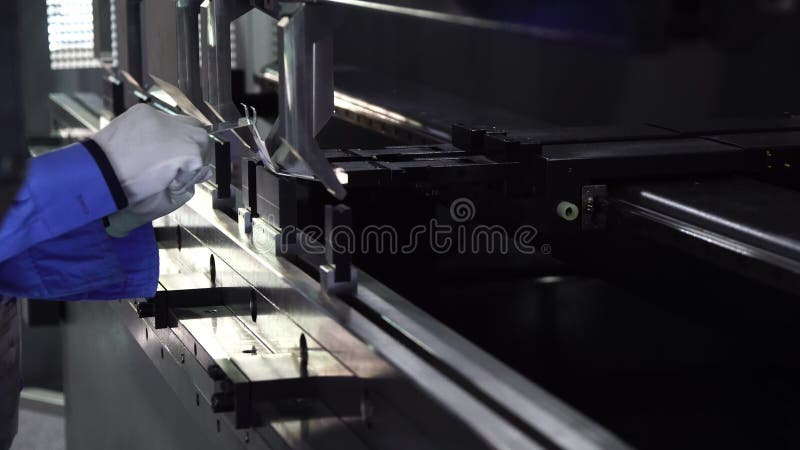 The Hydraulic Press Machine Operator Working at the Press Machine with ...