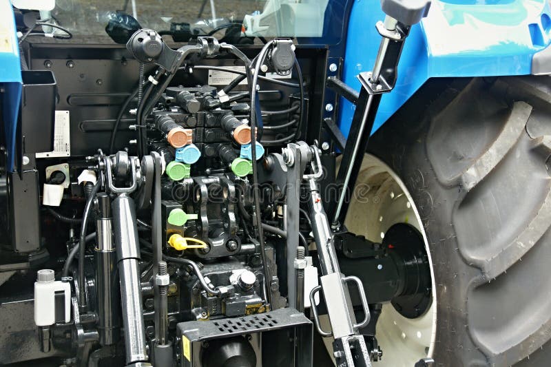 Close-up of the Hydraulic System and Rear Wheel of a Modern Blue ...