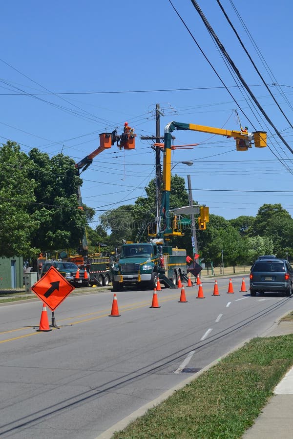 Electrician Working on High Power Lines in a Lift Stock Photo - Image ...