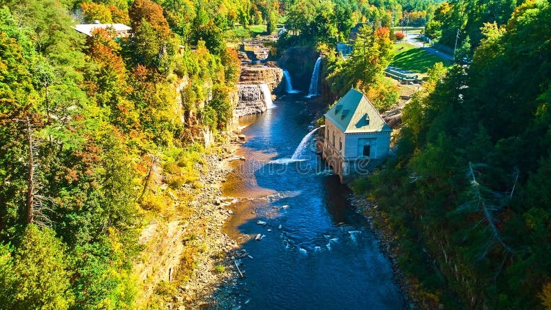 Hydroelectric Power Plant in Canyon with Huge Waterfalls Going Over ...