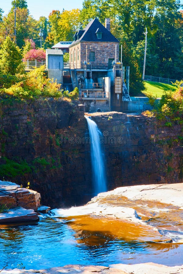 Hydroelectric Power Plant with Waterfall Over Cliffs in New York Stock ...