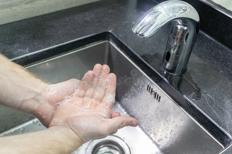 Hygiene Concept Washing Hands With Soap Man Soaps His Hands To