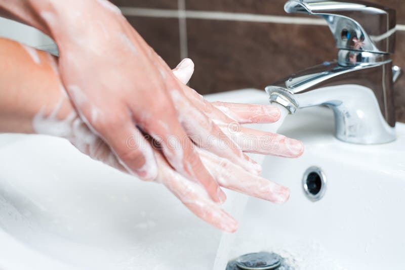 Hygiene Concept. Washing Hands with Soap Under the Faucet with Water ...