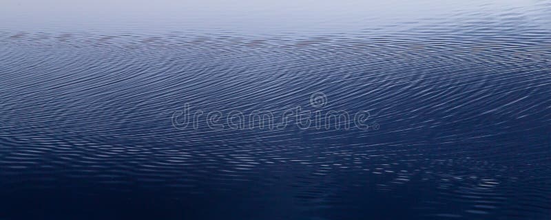 Hypnotic Geometric Ripples in Calm Crystal Waters Stock Photo - Image ...