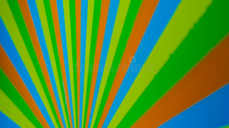 Hypnotic spinning pinwheel stock photo. Image of colorful - 161716444