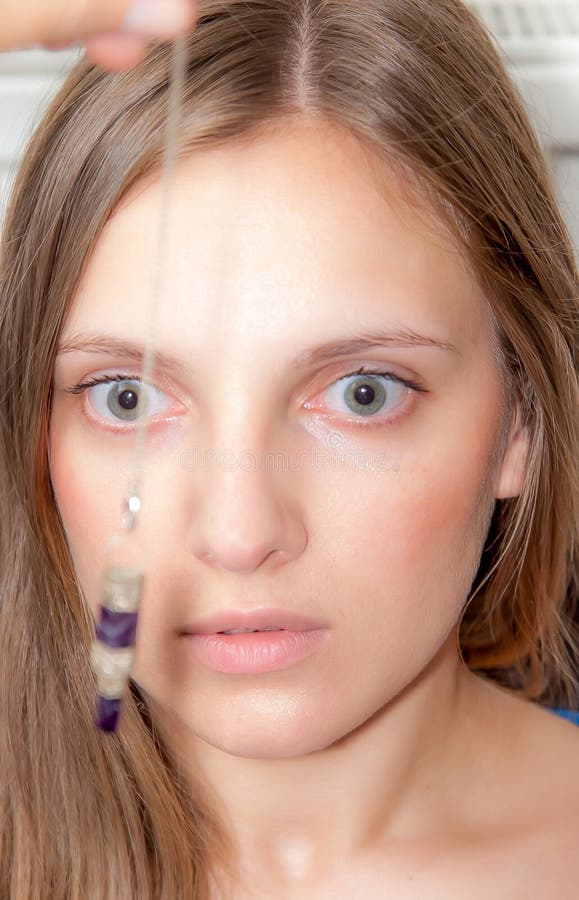 Hypnotized look stock image. Image of care, pendant, conversation ...