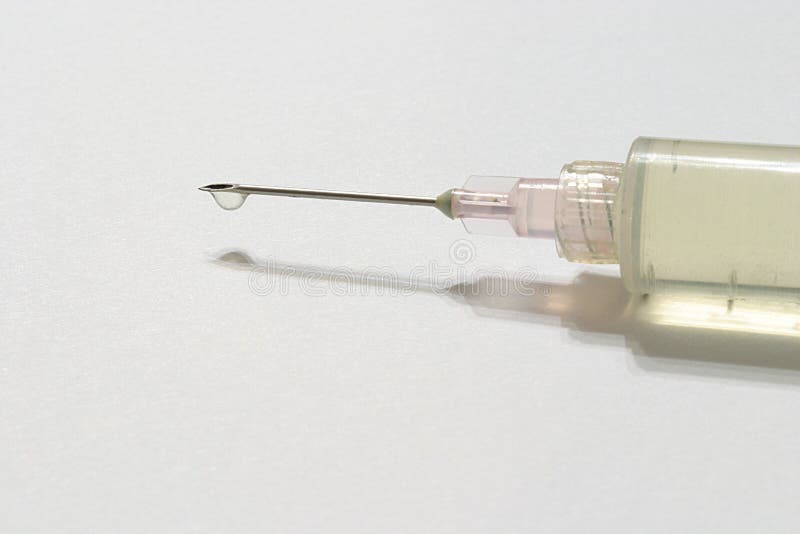Hypodermic with Droplet stock image. Image of sterile, cancer - 37277