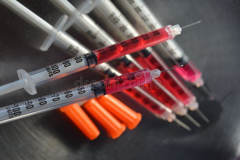 Hypodermic Needle Injection Needle on Texture Background Stock Photo ...