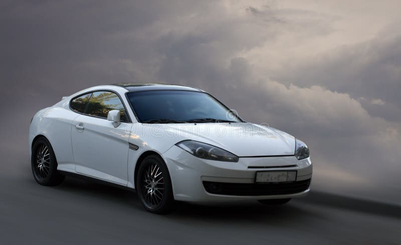 Hyundai Tuscani white car. stock image. Image of trace - 189979477