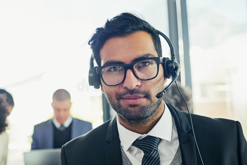 I Await Your Call. Portrait of a Friendly Support Agent Working in an ...