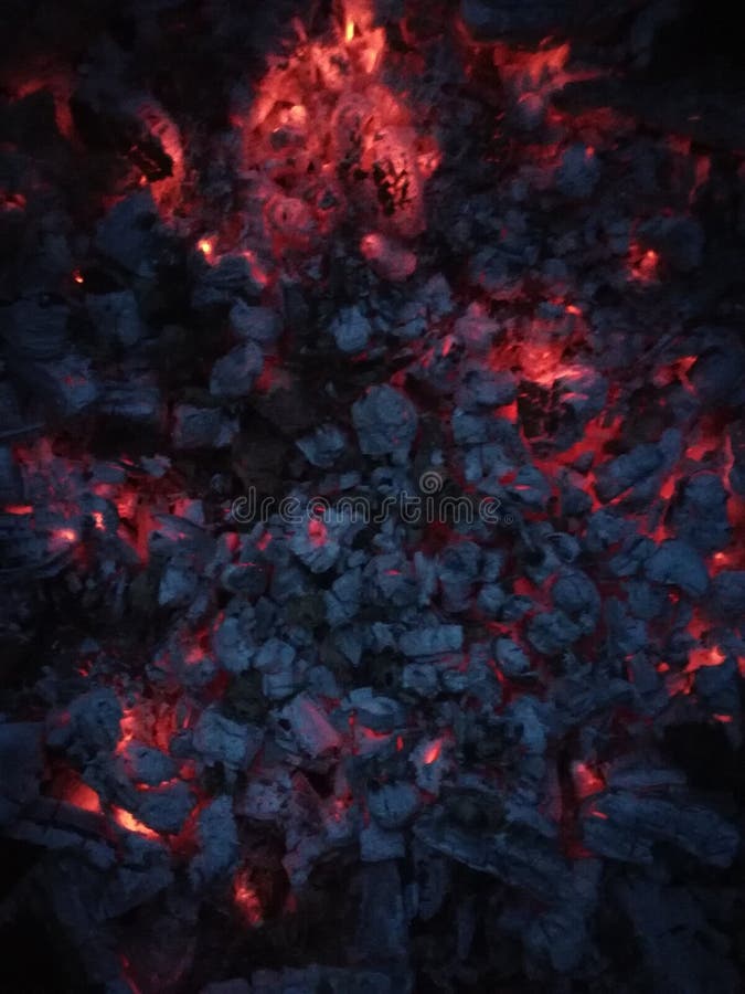 Smoldering Red Coals on a Black Background Stock Photo - Image of ...