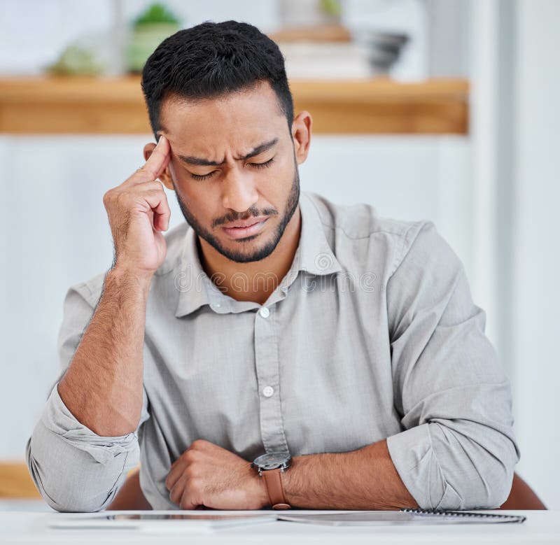 I Desperately Need a Break. a Young Businessman Experiencing a Headache ...