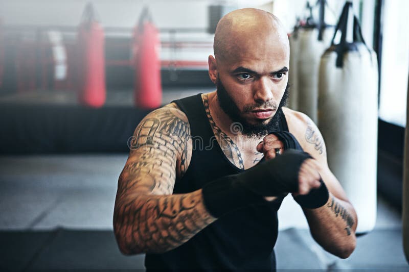 I Dont Need a Weapon, I am One. a Kick-boxer Training in a Gym. Stock ...