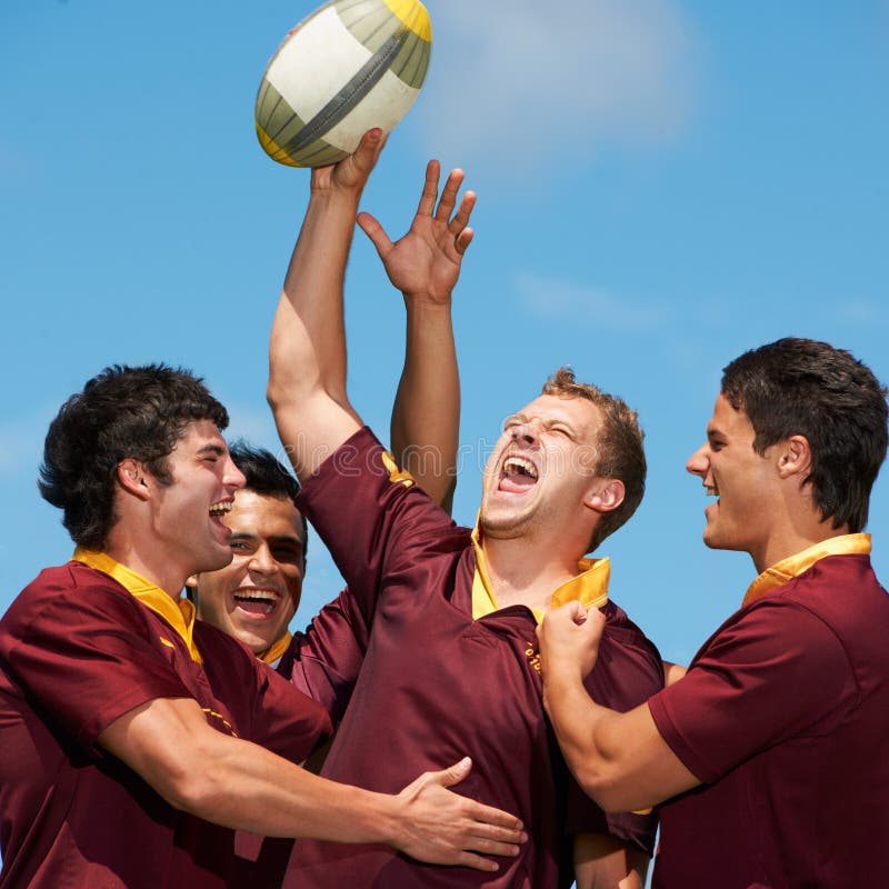 I Got the Ball. a Young Rugby Team Celebrating a Victory. Stock Image ...