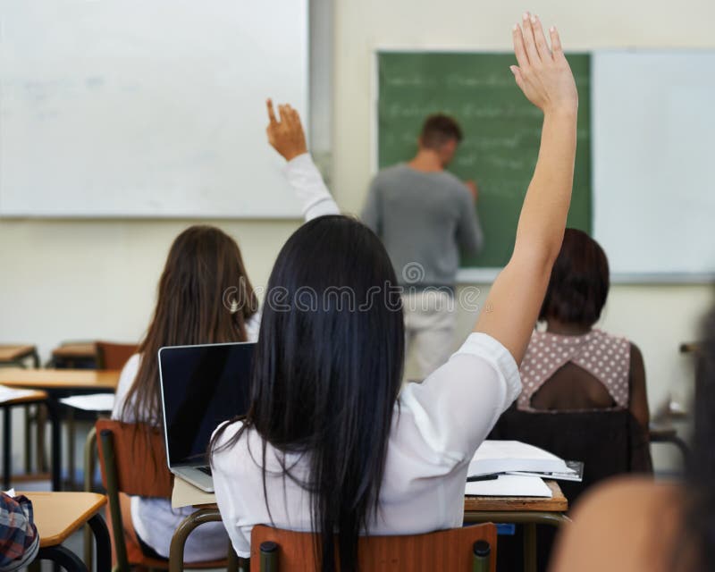 I Have a Question...a Female Student Raising Her Hand To Ask a Question ...