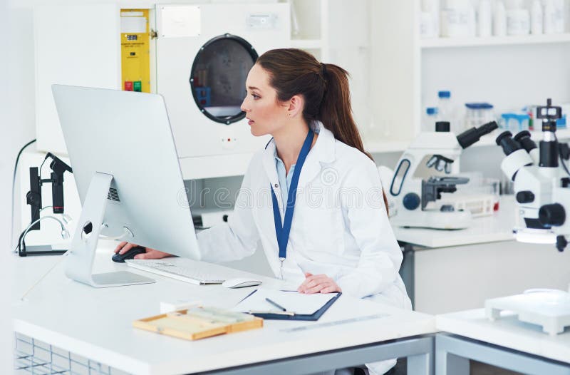 I Have To Send this Data through. a Focused Young Female Scientist ...