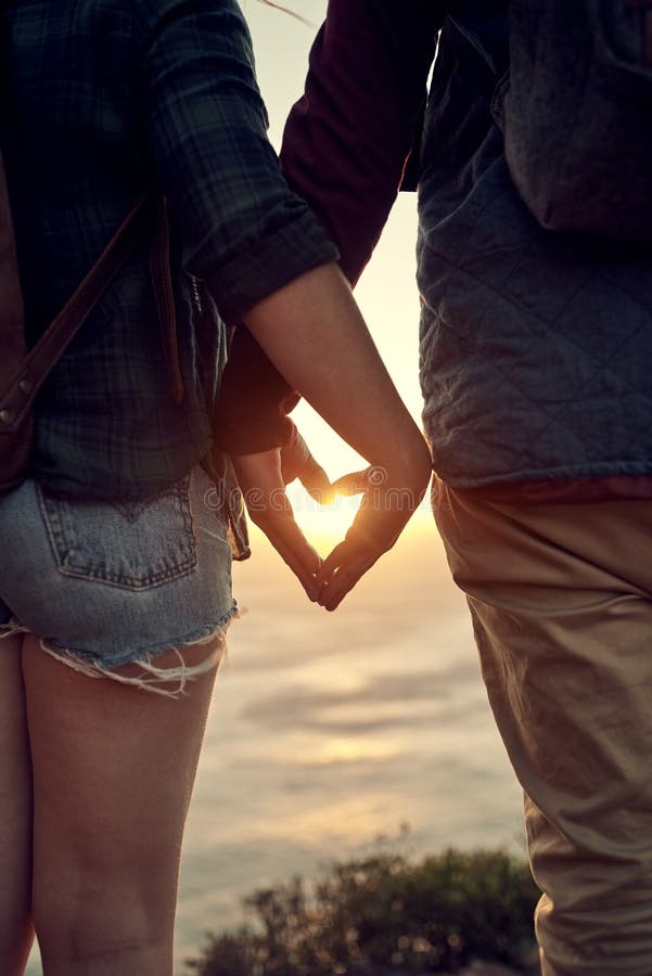 I Heart You. Rearview Shot of an Unrecognizables Hands Making a Heart ...