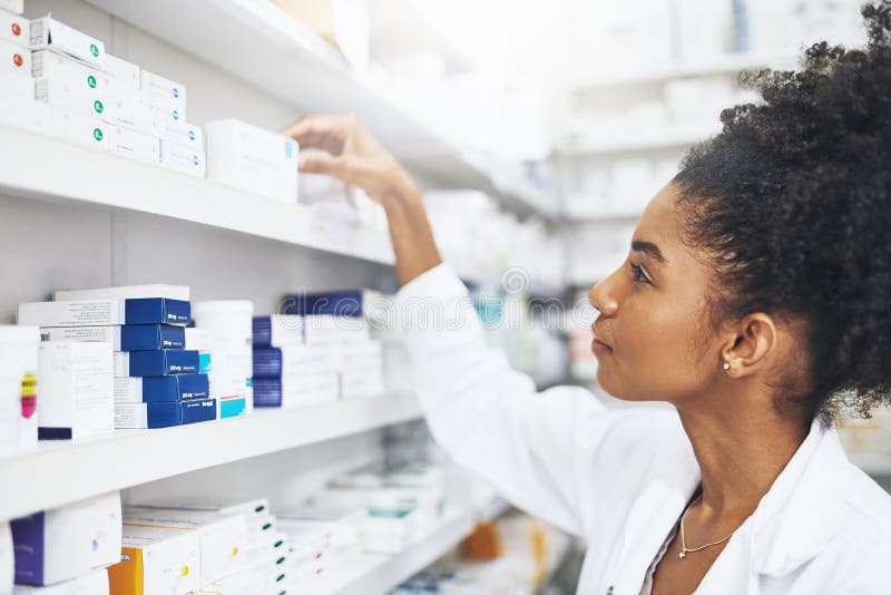 I Know this Medication Will Work. a Female Pharmacist Taking a Product ...