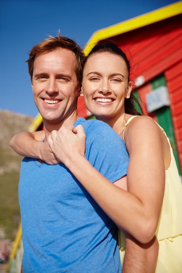 I Love Coming Here on Holiday. a Couple on a Beachside Holiday. Stock ...