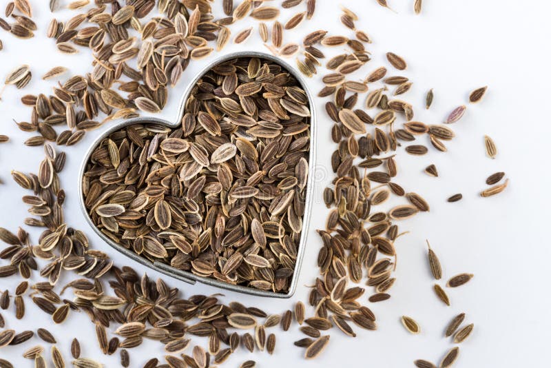 Dill Seeds in a Heart Shape Stock Photo - Image of culinary, heart ...